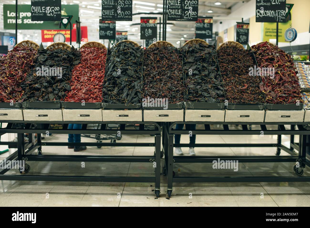 Heap of Pasilla chile. Dried chilaca chili pepper also called chile ...