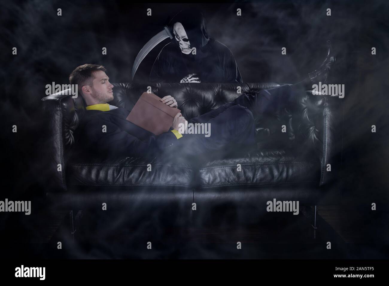 Man laying asleep on a couch with a book and being haunted by a ghost ...