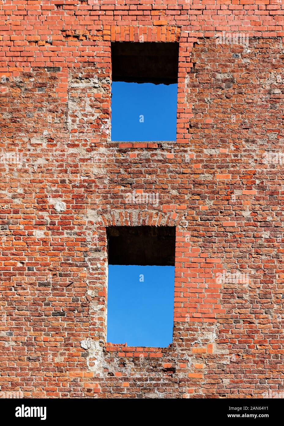 View to brick wall with empty windows Stock Photo - Alamy