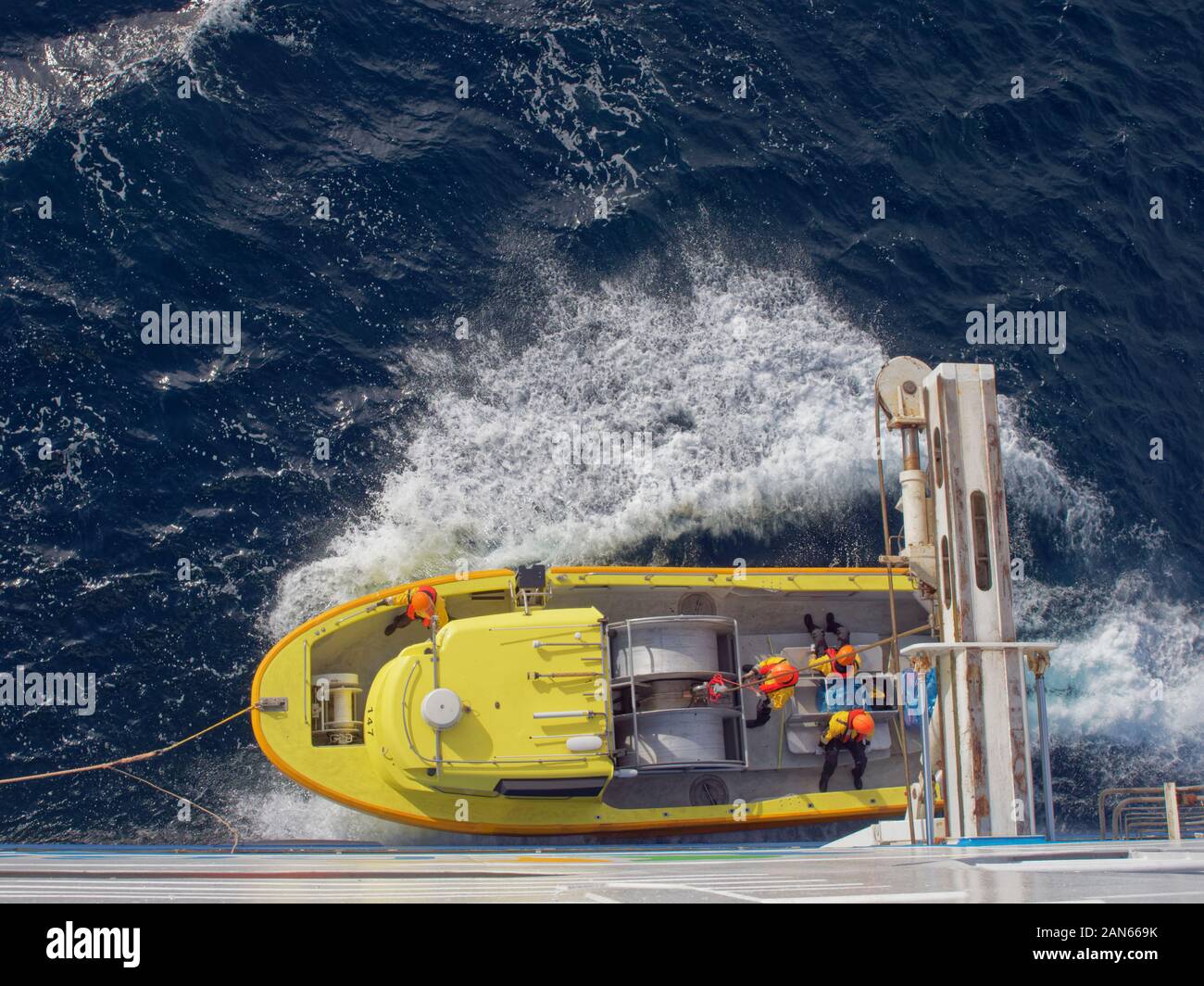 A Seismic Workboat being launched from the Mother Ship for a Personnel ...