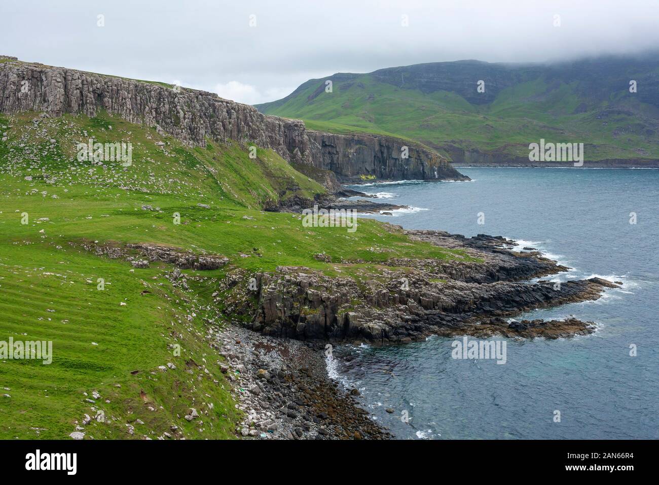 Neist Point Lighthouse, fields, cliffs, and sheep on the Isle of Skye ...