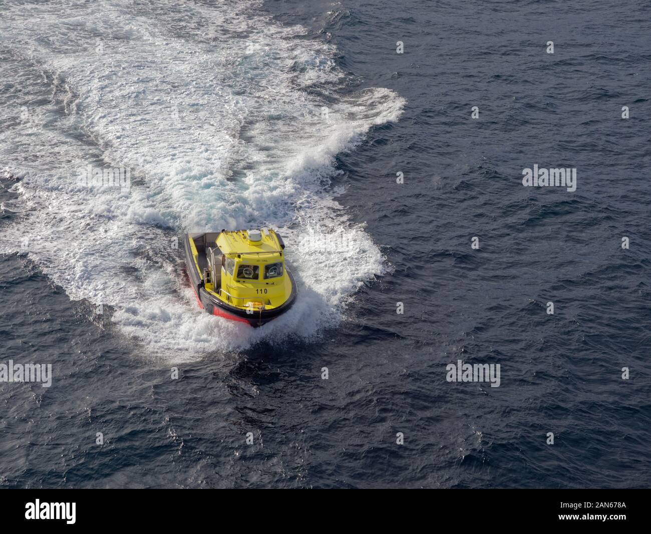 A Seismic Workboat approaching the Mother Vessel in preparation for ...