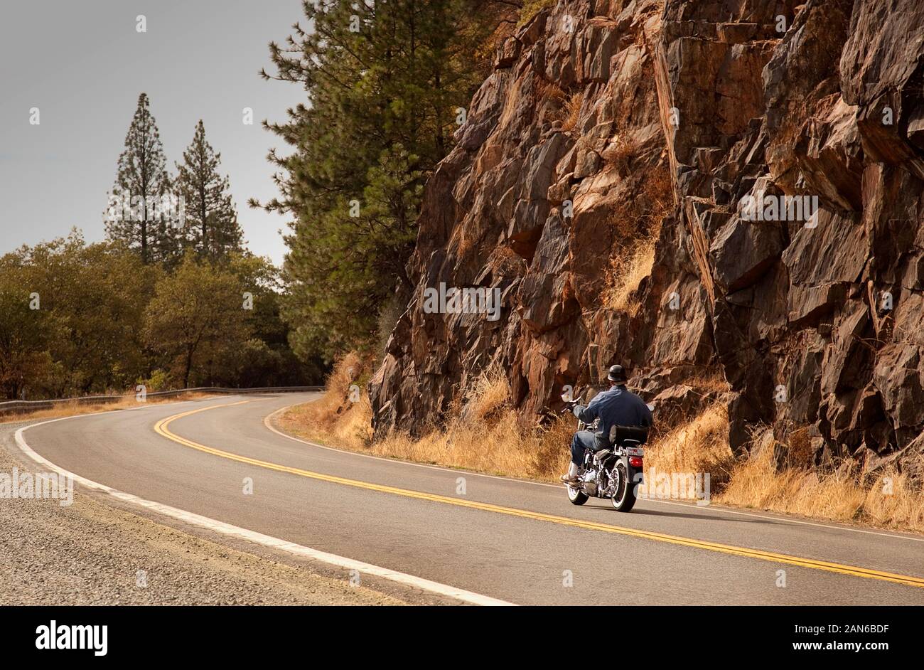 Biker on HWY 49 gold rush trail California USA Stock Photo - Alamy