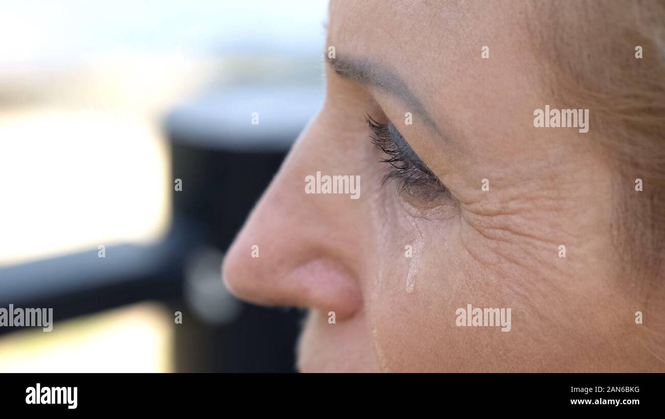 Tears falling down old woman face, forgotten by children, fear for ...