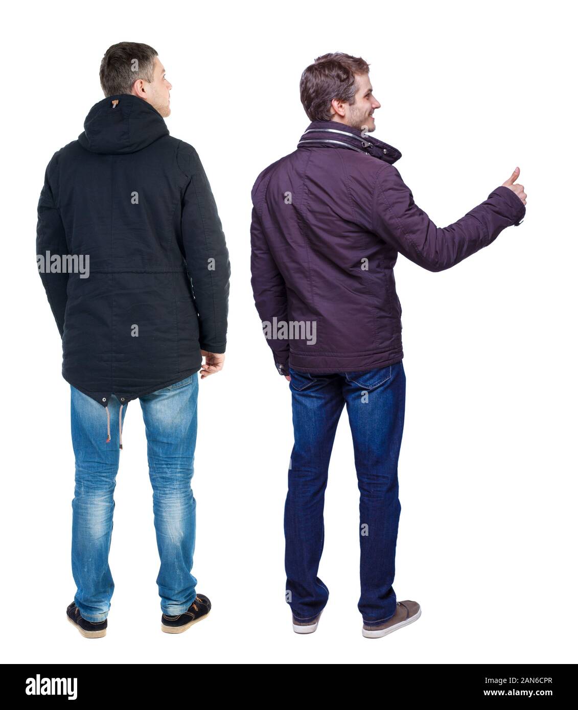 Back view of two man in winter jacket showing thumb up. Rear view ...