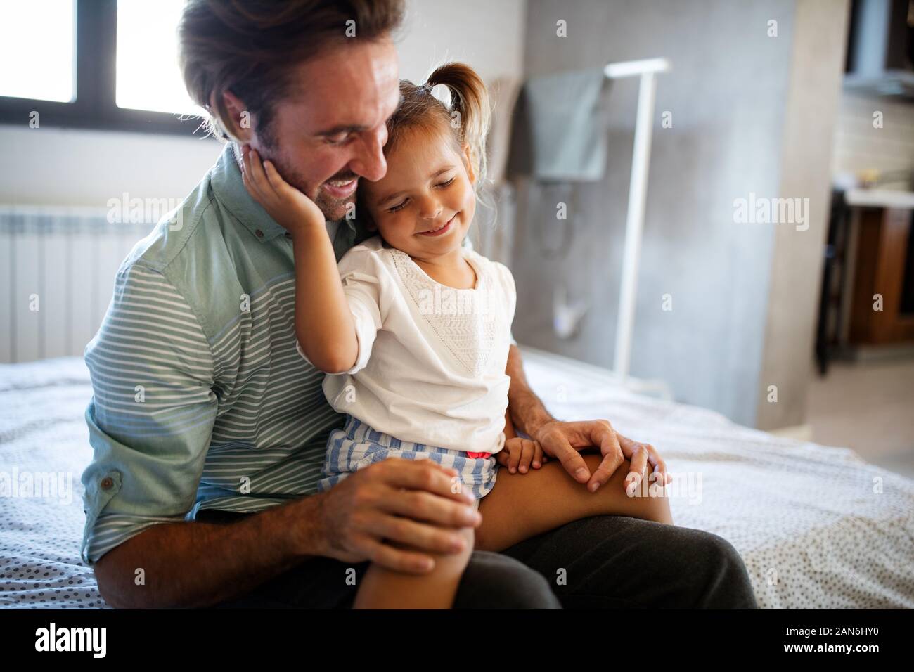Father and daughter spending time together at home Stock Photo - Alamy