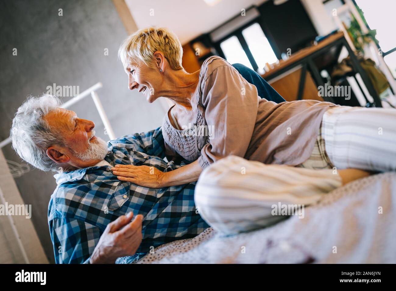 Mature couple bed love hi-res stock photography and images - Alamy