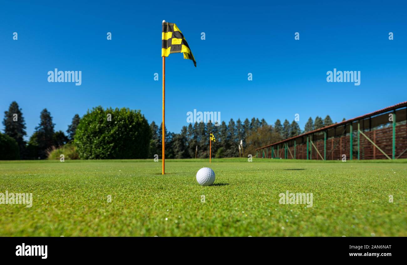 golf ball in a driving range Stock Photo - Alamy
