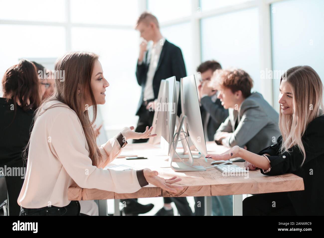 employees discussing ideas for a new project at a working meeting Stock ...