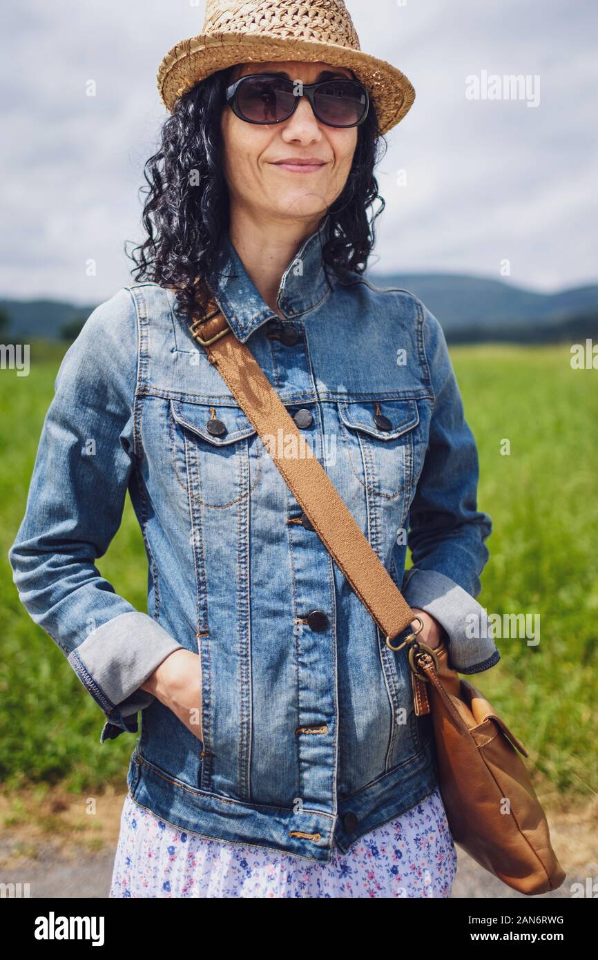 White woman standing on the countryside Stock Photo - Alamy