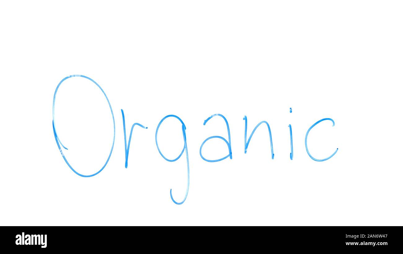 Hand crossing word organic written on glass, genetically modified food ...