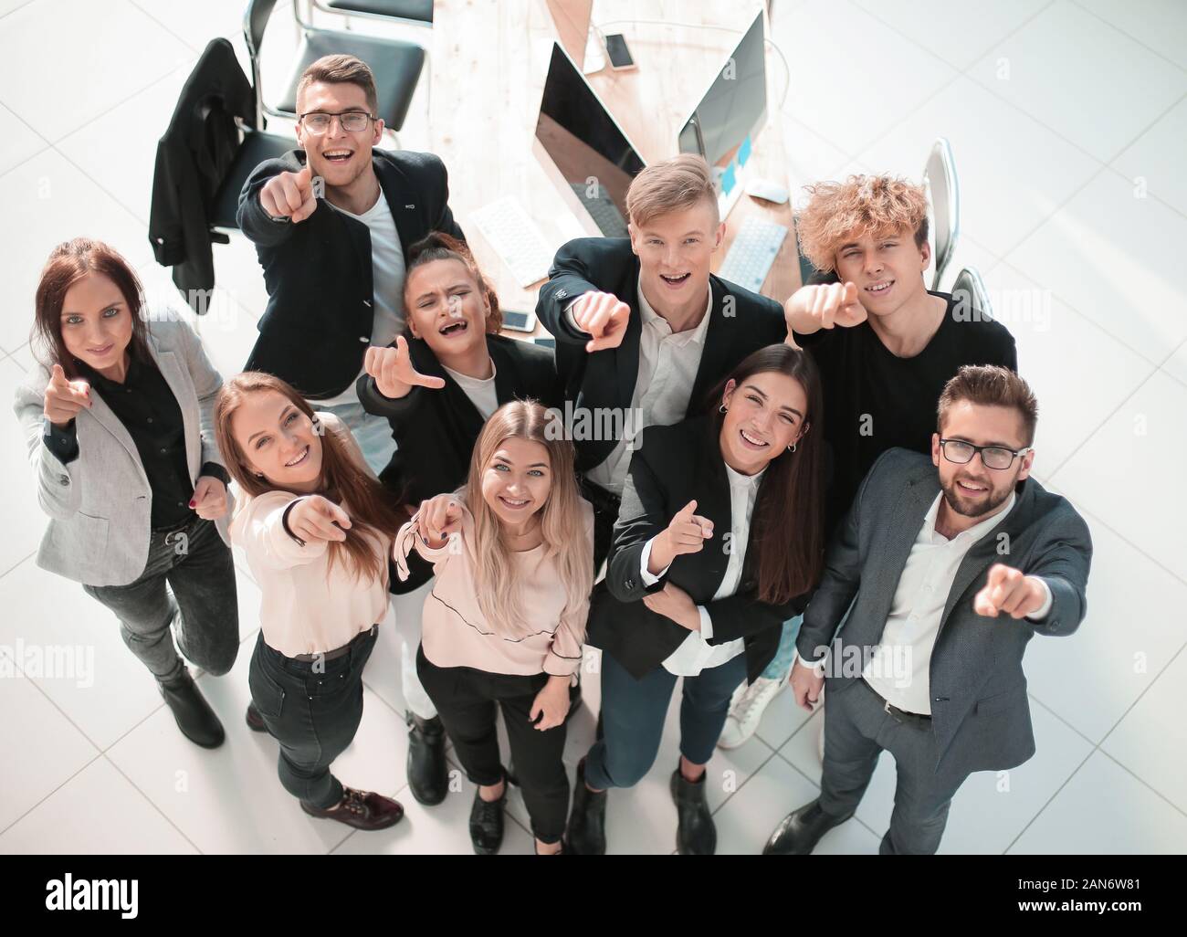 top view. smiling young business team looking at the camera Stock Photo ...