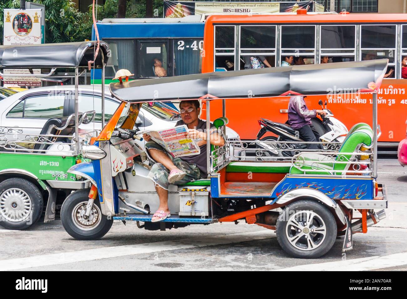 Bus reading newspaper hi-res stock photography and images - Alamy