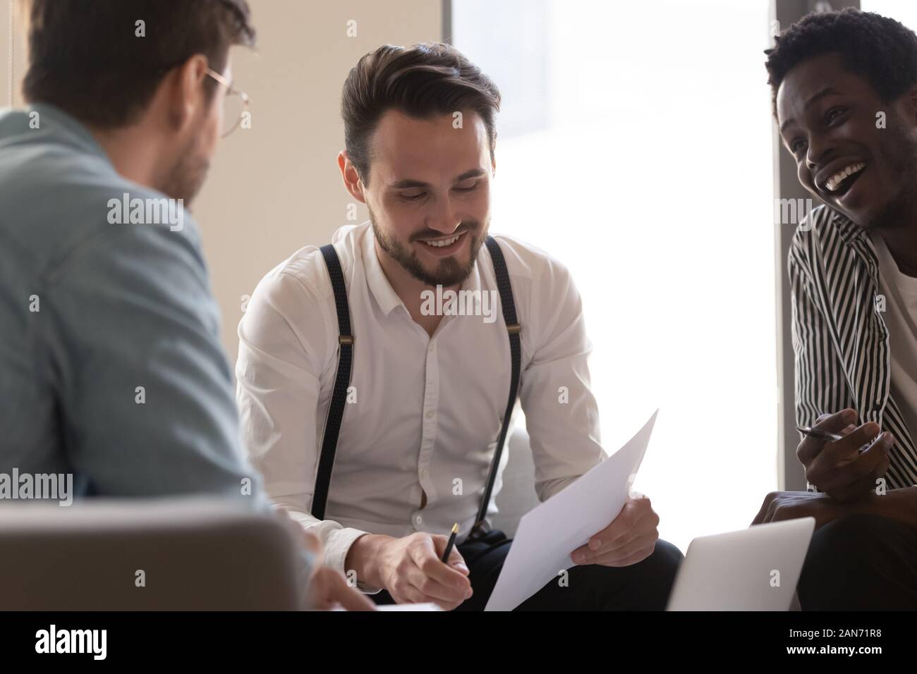 Team successful positive colleagues hi-res stock photography and images ...