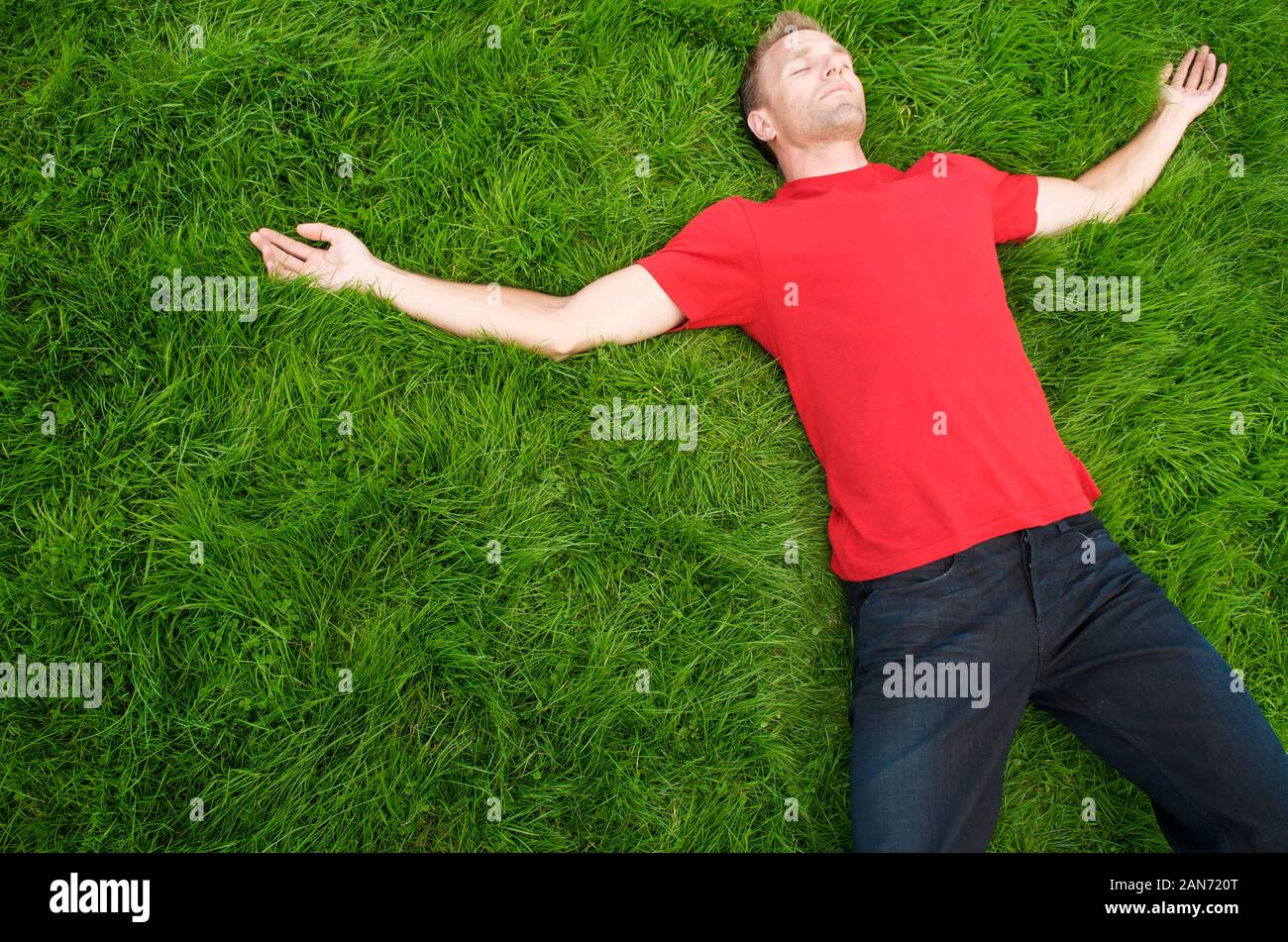 Lying on the back with the arms spread hi-res stock photography and ...