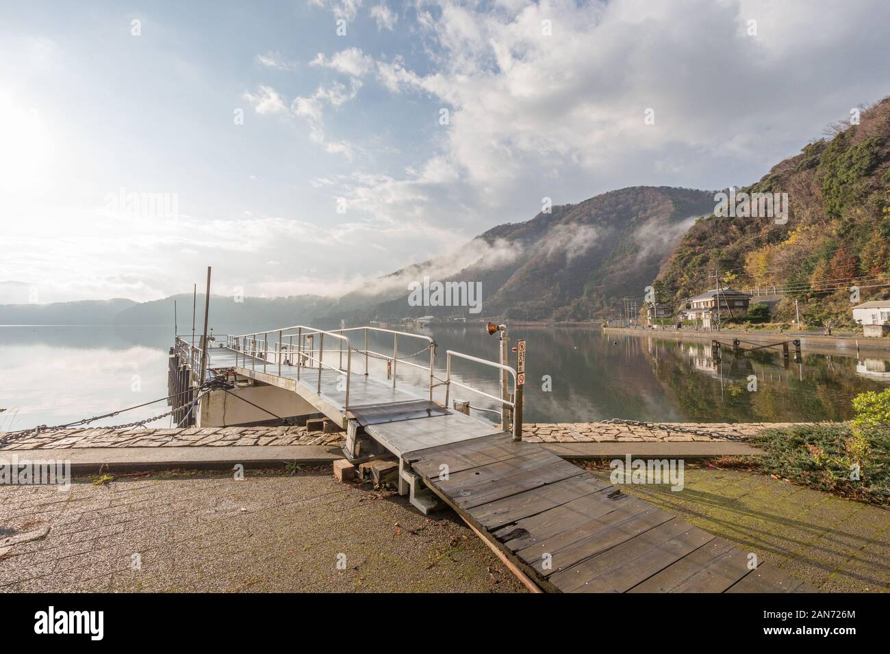 Boat landing stage dock in early morning, with view of Lake Suigetsu ...