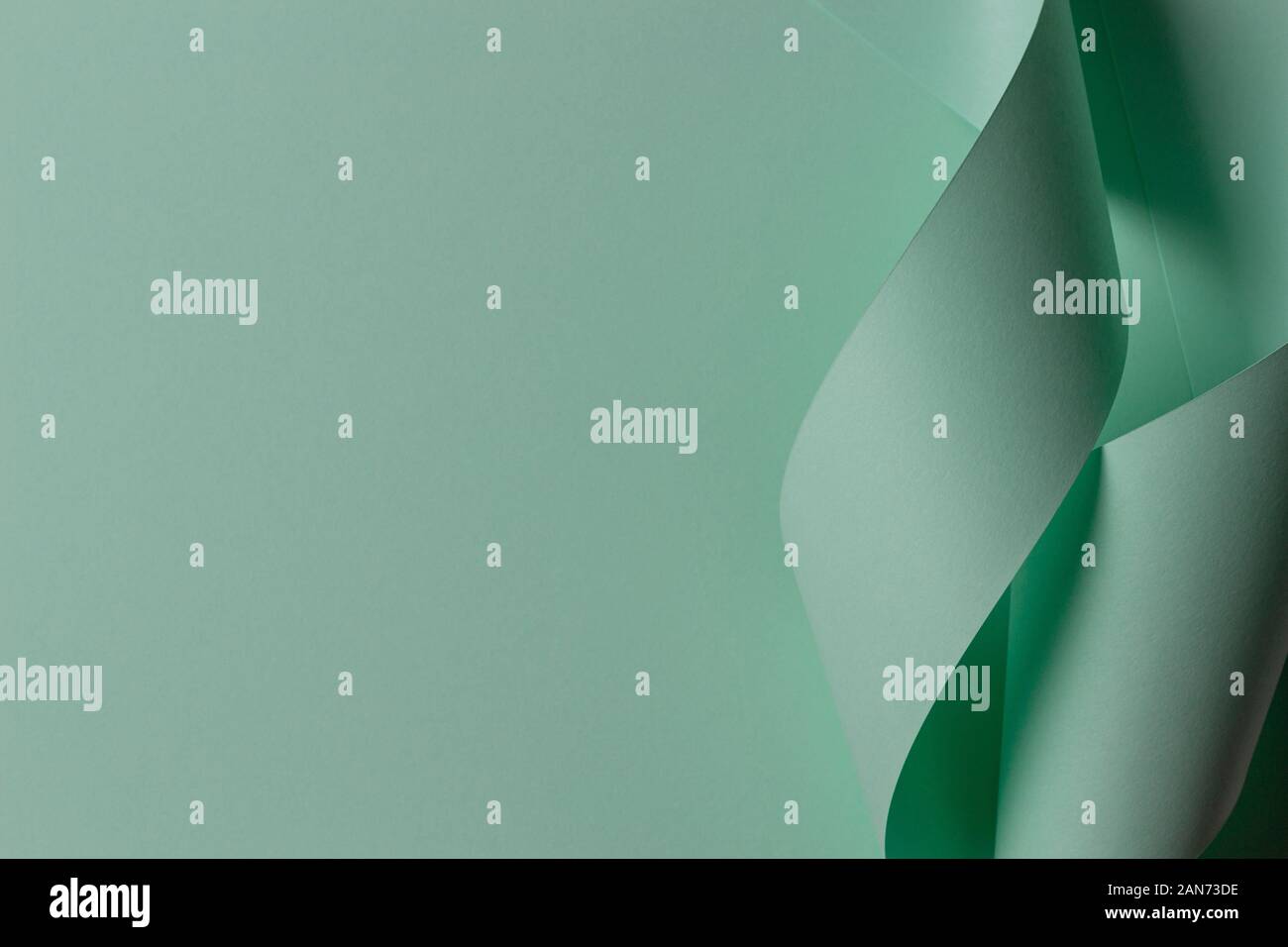 Abstract geometric shape green color paper background Stock Photo - Alamy