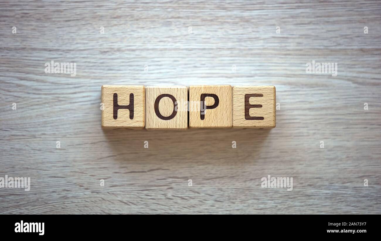 Hope word made of cubes, pure and genuine belief in god, prayers and ...