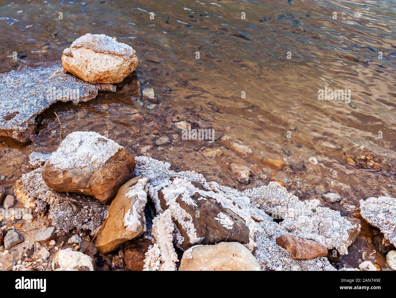 Stone, water and salt of the Dead sea Stock Photo - Alamy