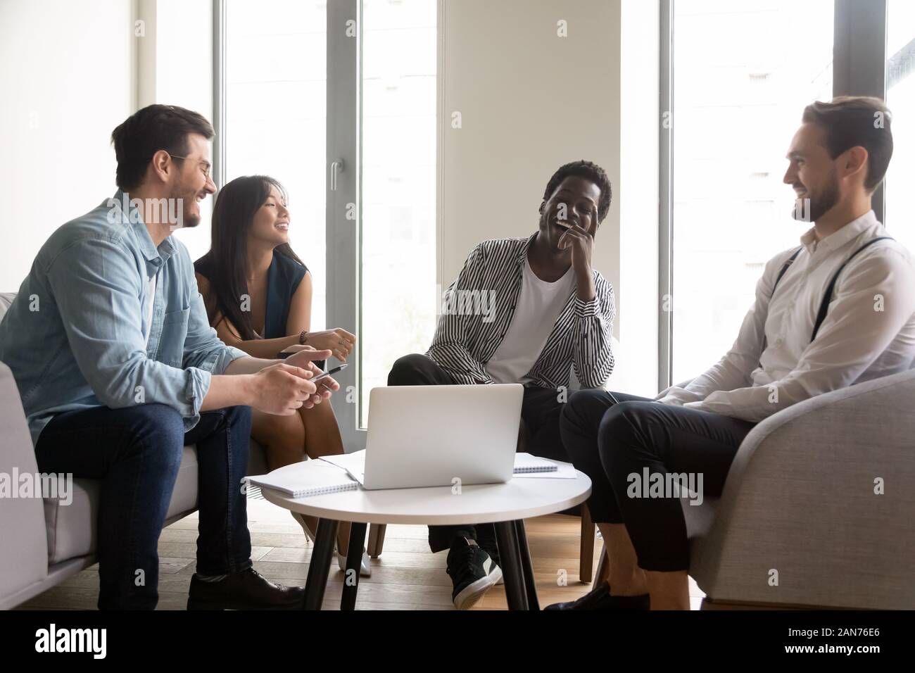 Group laugh meeting project hi-res stock photography and images - Alamy