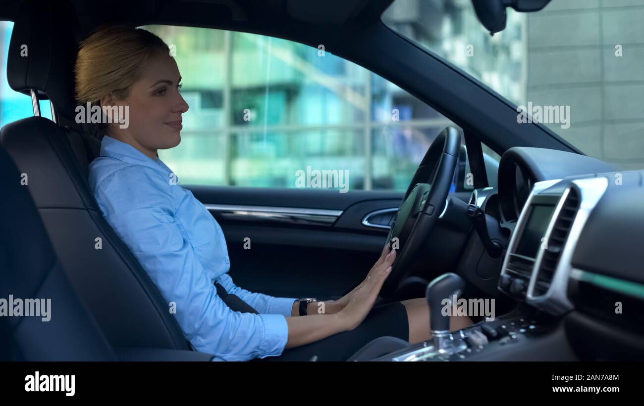 Successful female buying luxury vehicle hi-res stock photography and ...