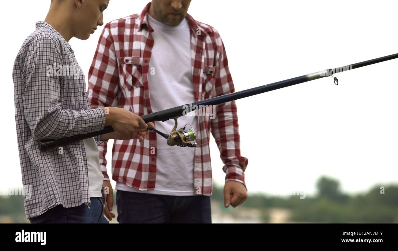 Father teenage son fishing hi-res stock photography and images - Alamy