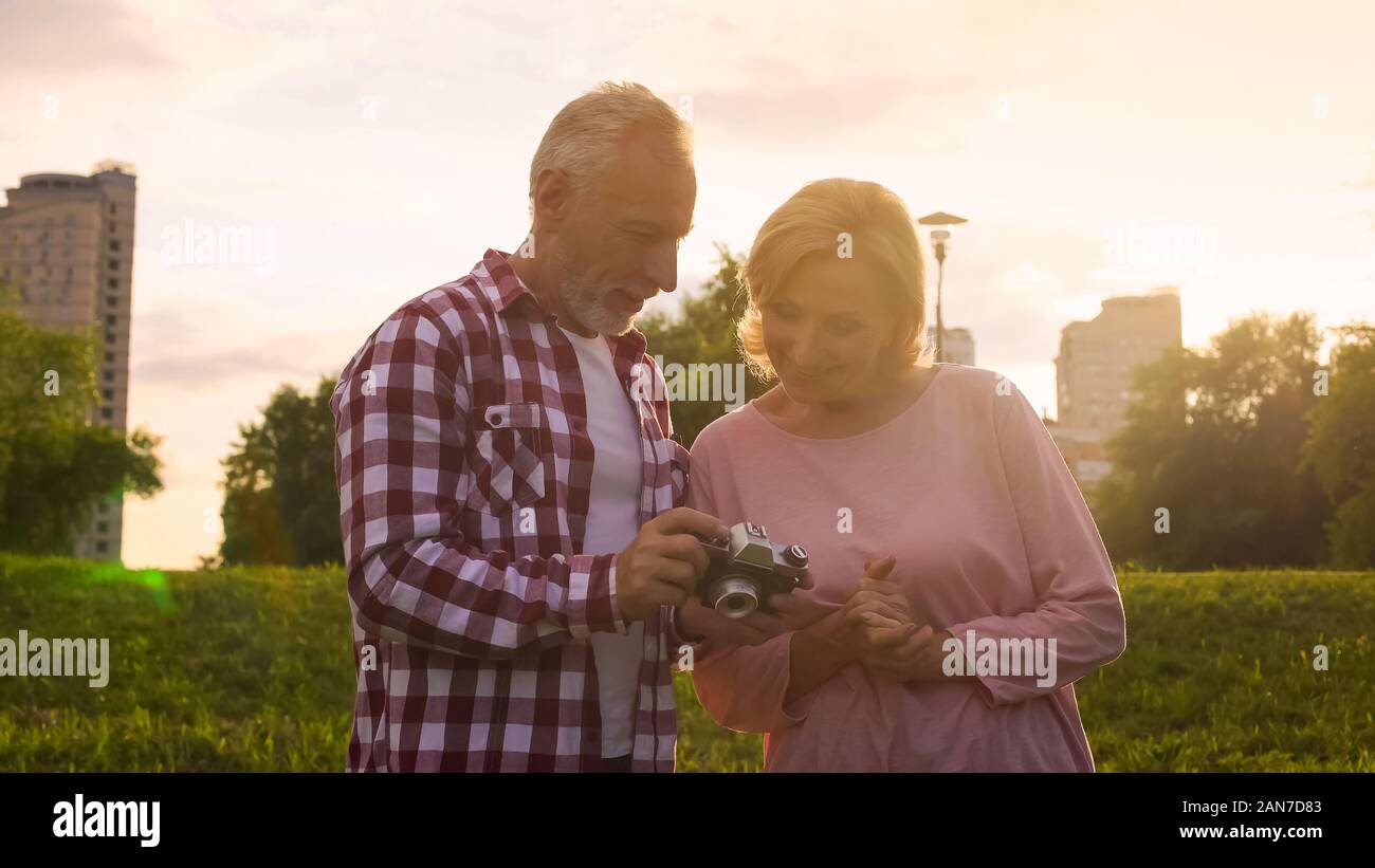 Viewing old photos hi-res stock photography and images - Alamy