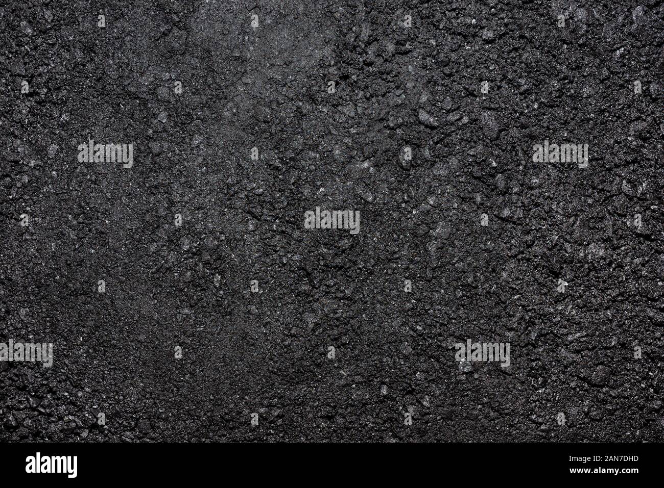 Texture made from a small pieces of coal, close-up shot Stock Photo - Alamy