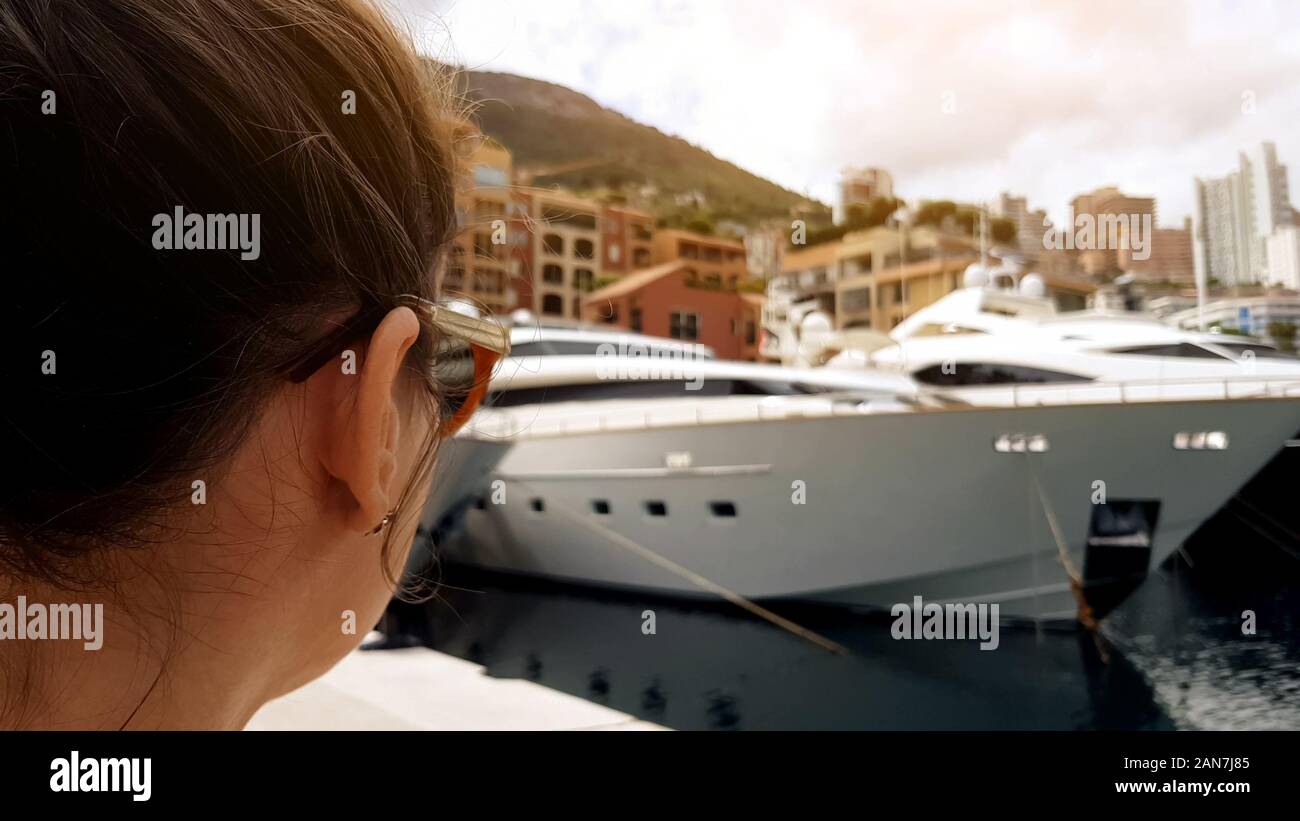 Female observing yachts hi-res stock photography and images - Alamy
