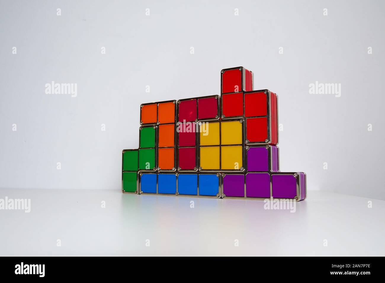 Tetris toy blocks on a neutral background Stock Photo - Alamy