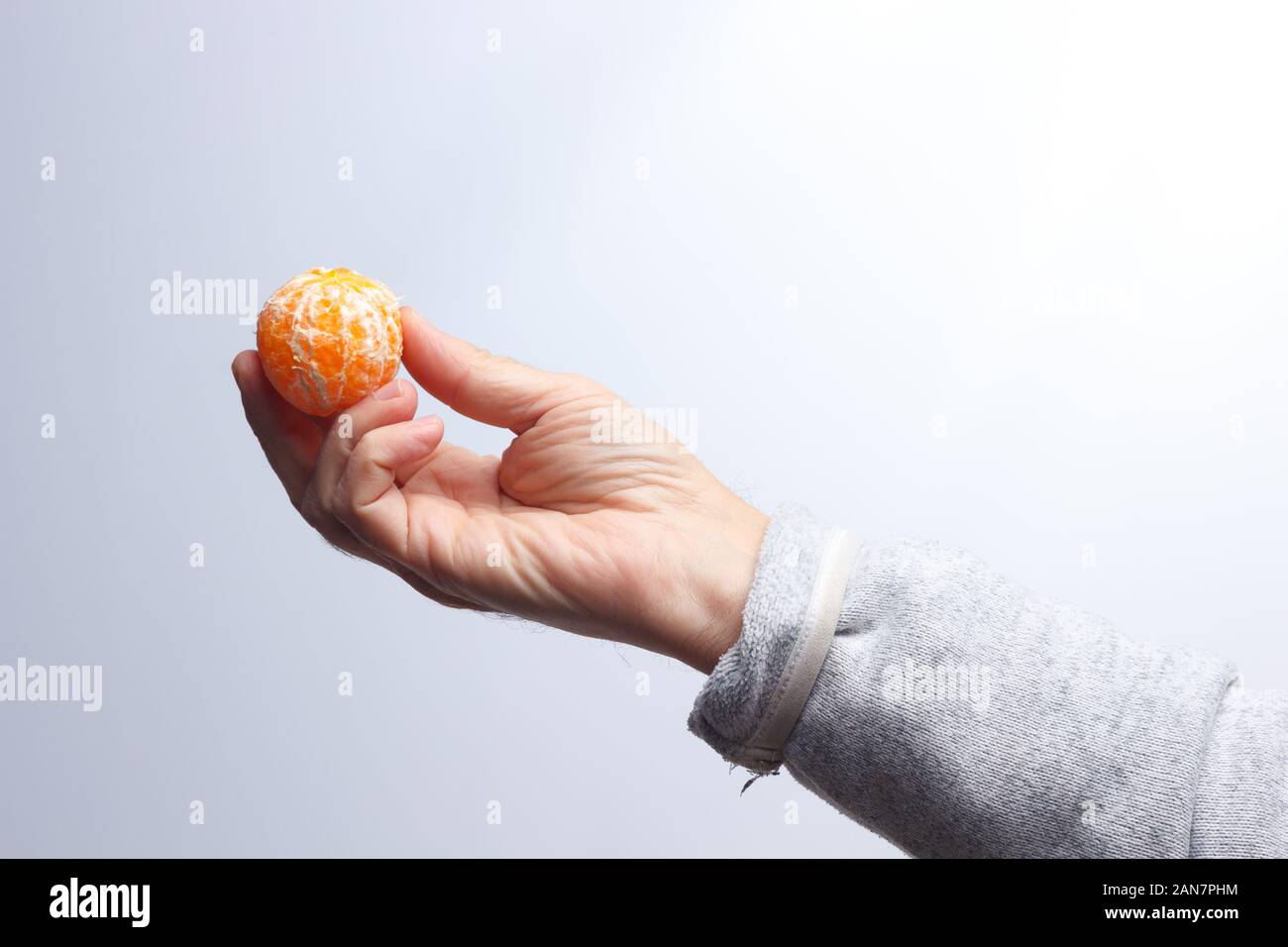 Tangerine is a fruit of the citrus family, it is sweet and has a slight ...