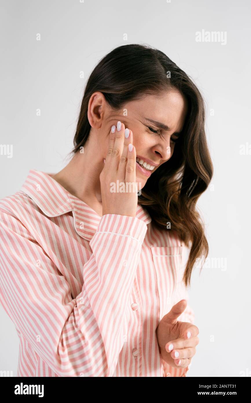Young woman suffering from toothache Stock Photo - Alamy