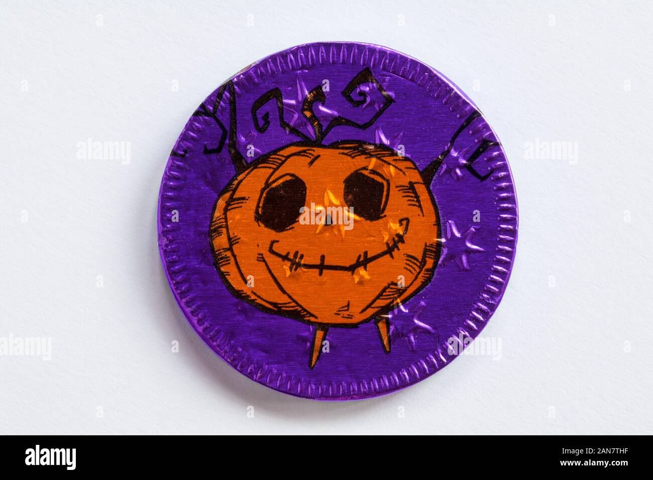 Halloween Belgian milk chocolate coin foil wrapped isolated on white ...