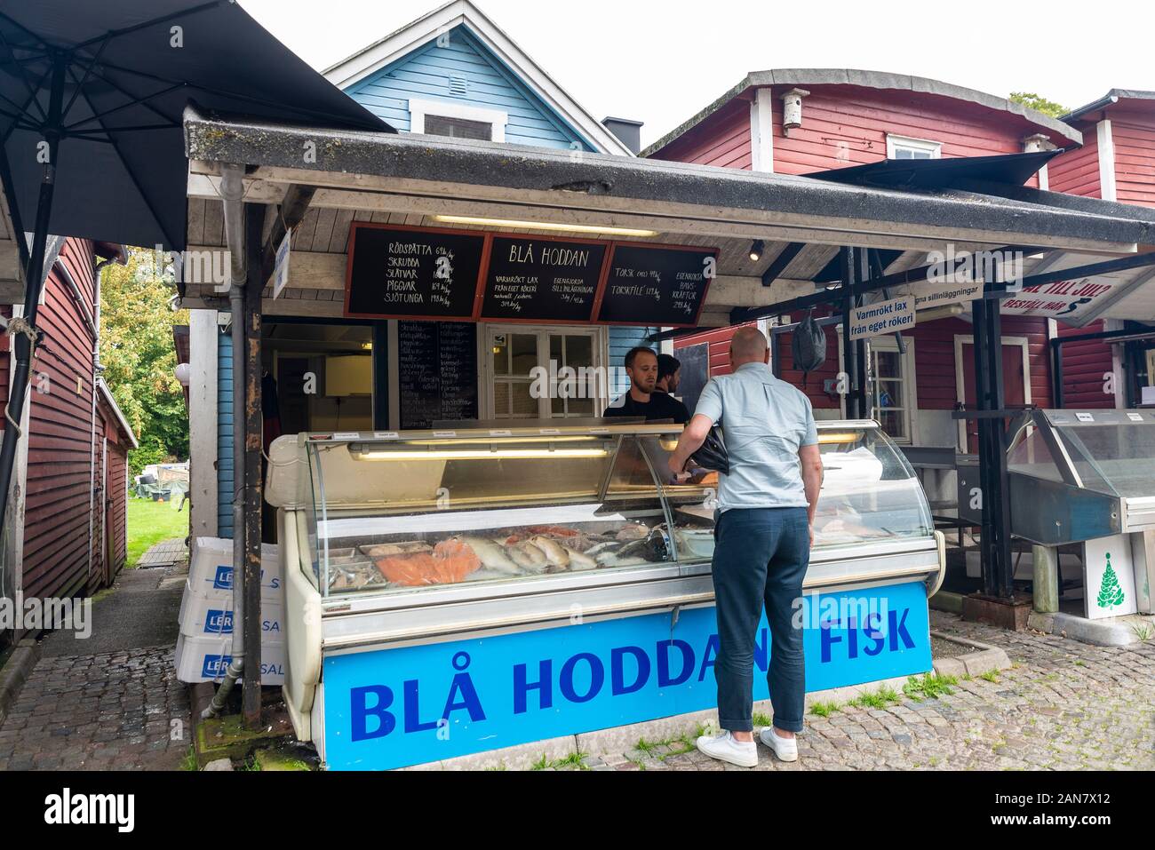 Malmo, Sweden - August 29, 2019: Fish seller serving a customer in ...