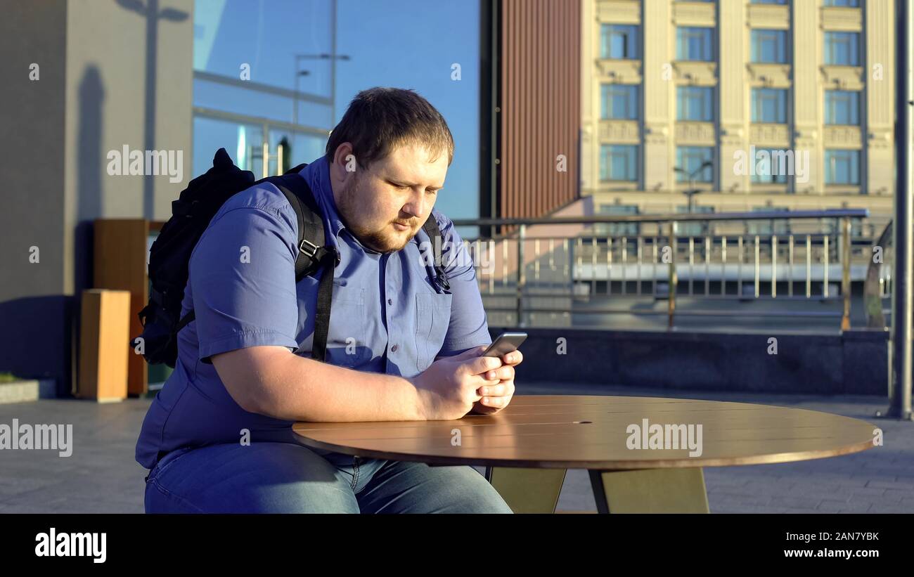Fat young man hi-res stock photography and images - Alamy