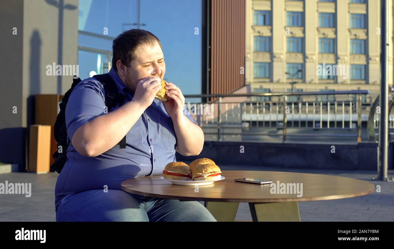 Fat guy junk food hi-res stock photography and images - Alamy