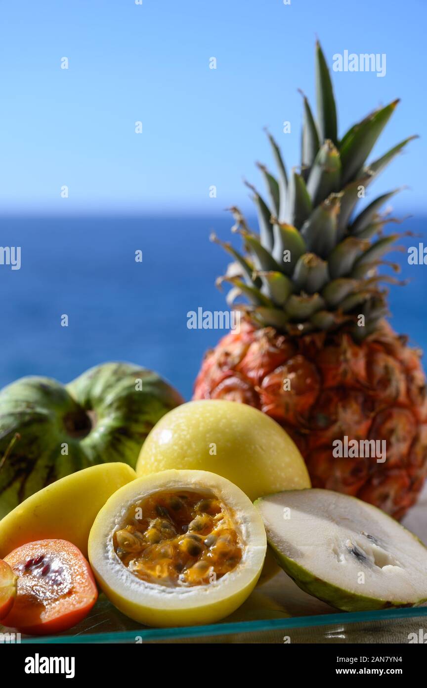 Tropical fruits collection, custard apple or green ripe cherymoia ...