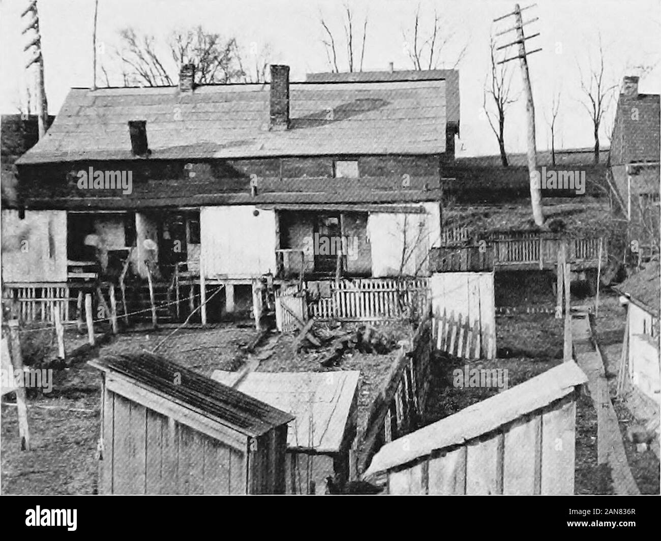 Overcrowding house Black and White Stock Photos & Images - Alamy