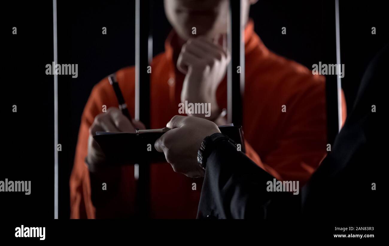 Man behind bars prison hi-res stock photography and images - Alamy