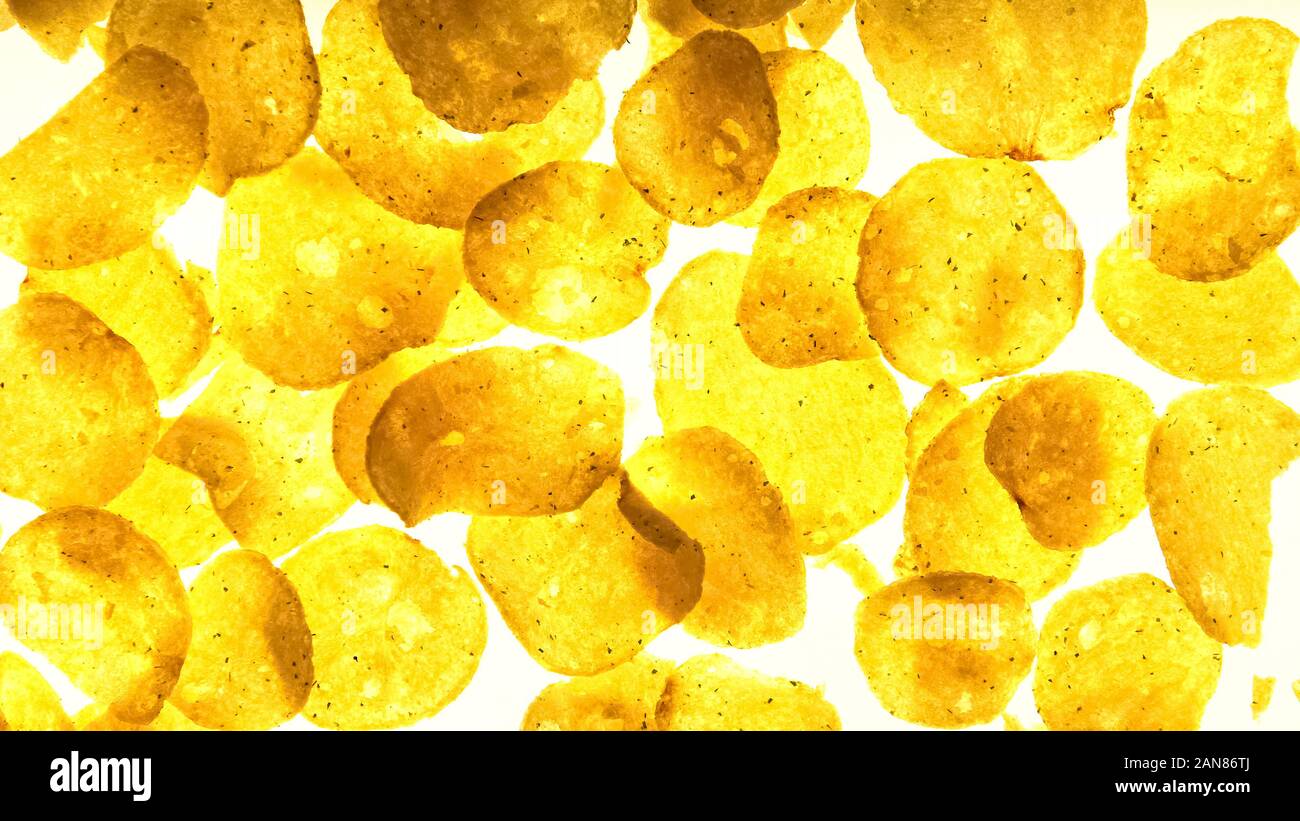Crispy chips flat-lay on white background, cooking process, junk food ...