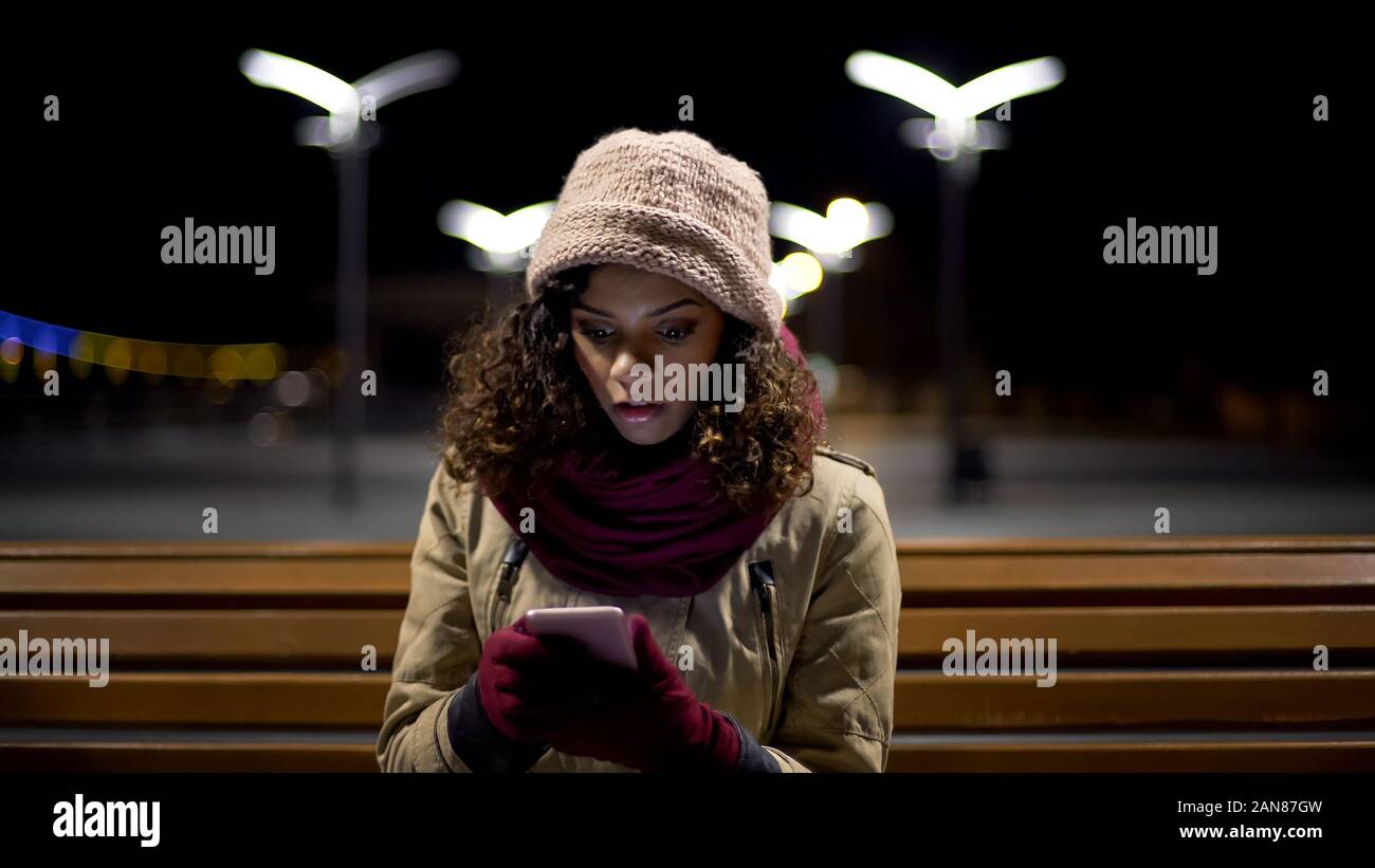 Astonished girl watching photos of ex-boyfriend with new girlfriend ...