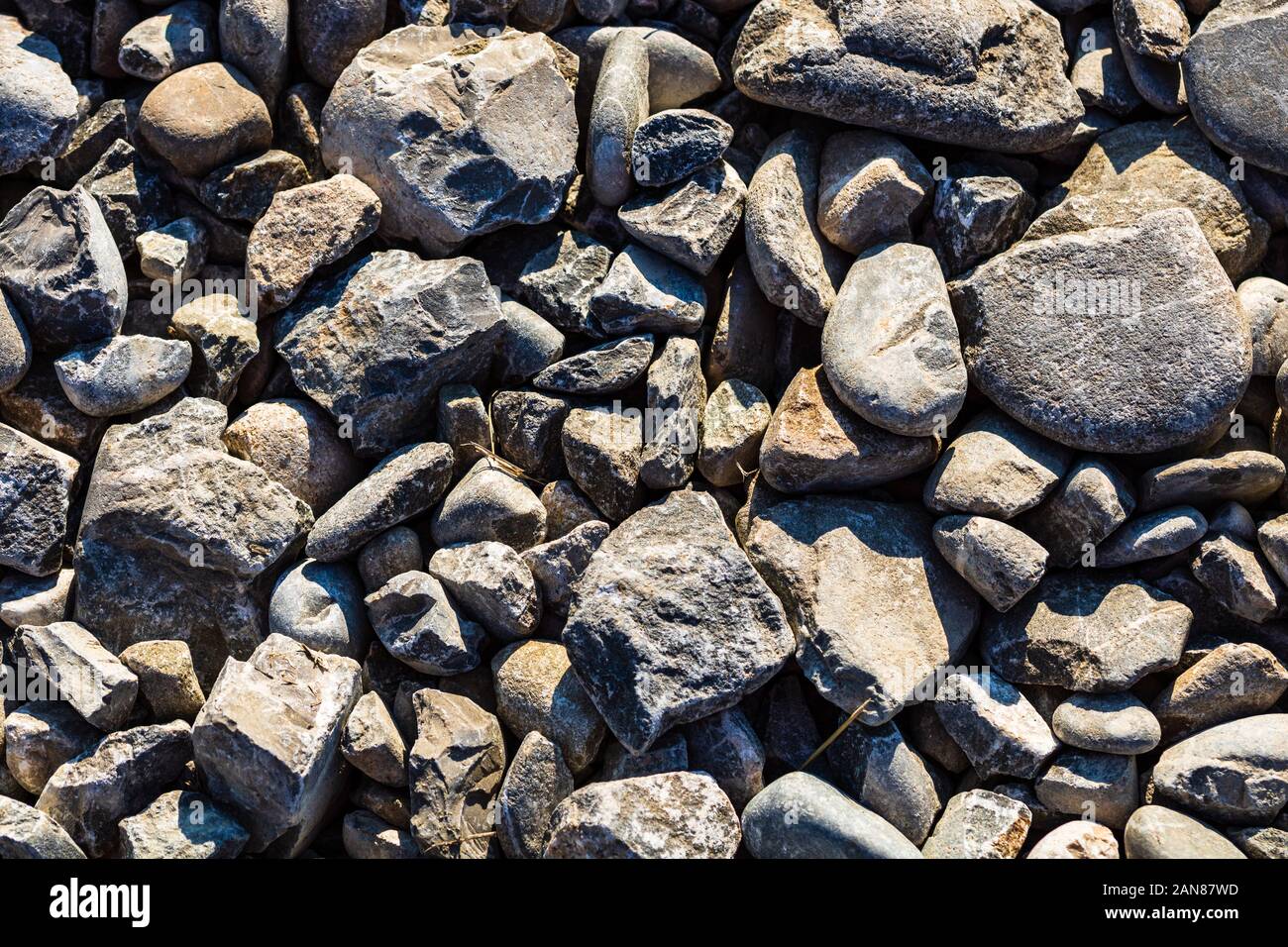 Background with little grey stones. Stone, surface Stock Photo - Alamy