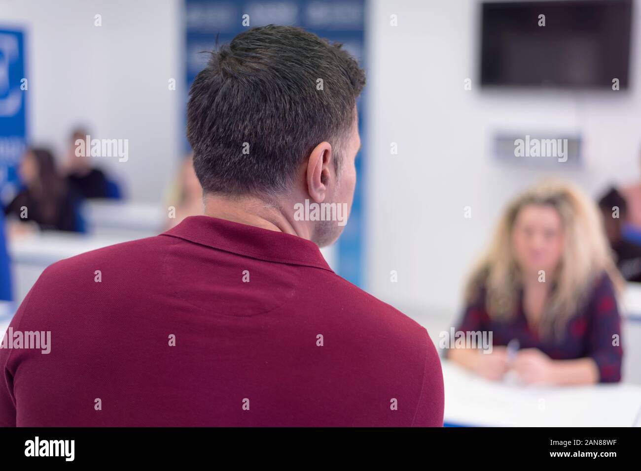 Male Professor Holding Lecture to Multi Ethnic Group of Students. Smart ...