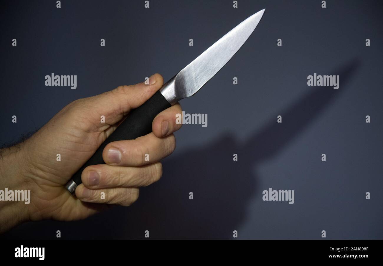 A model poses holding a knife. PA Photo. Picture date: Thursday January ...