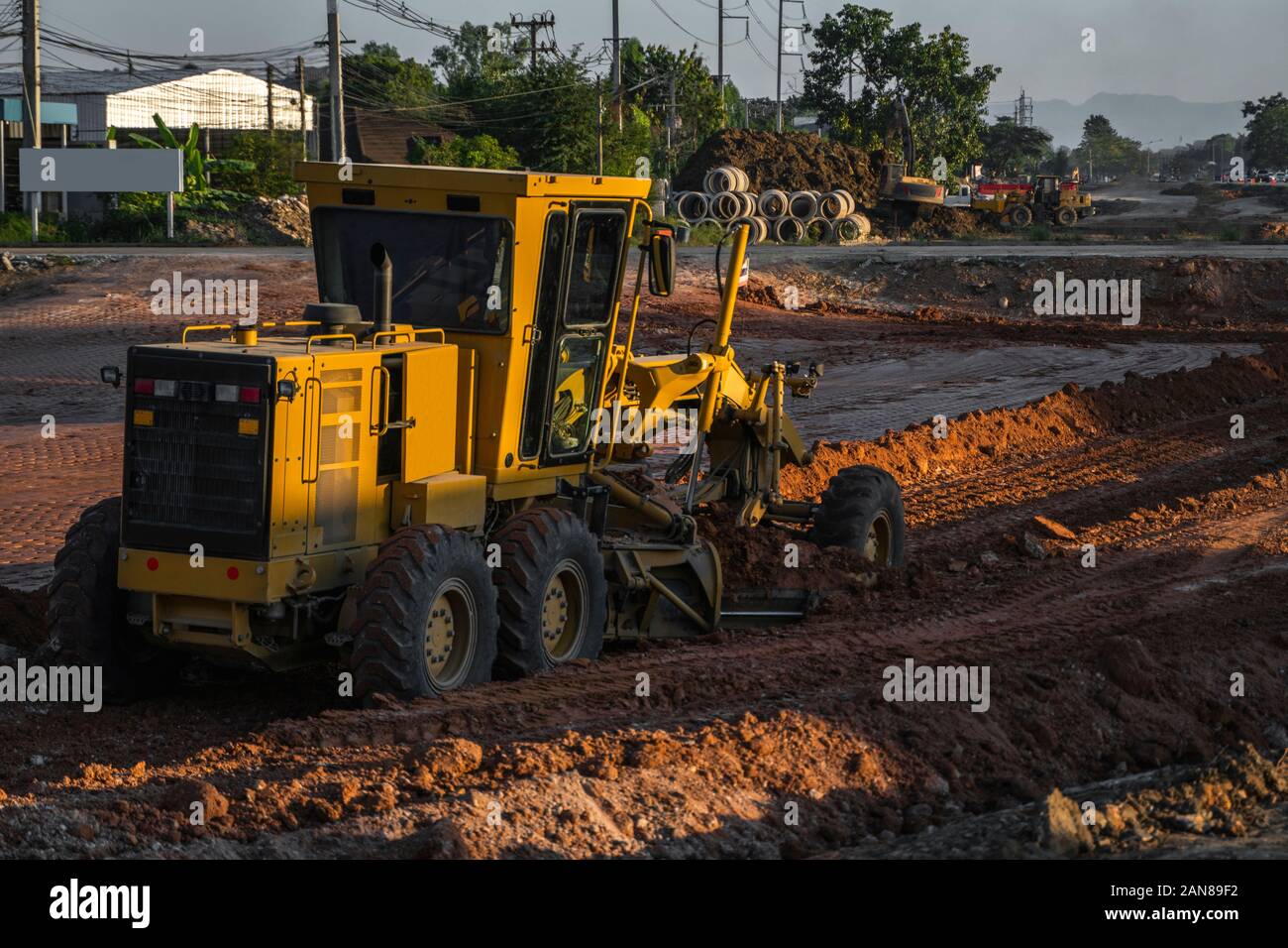 Grader is working on road construction. Grader industrial machine on ...