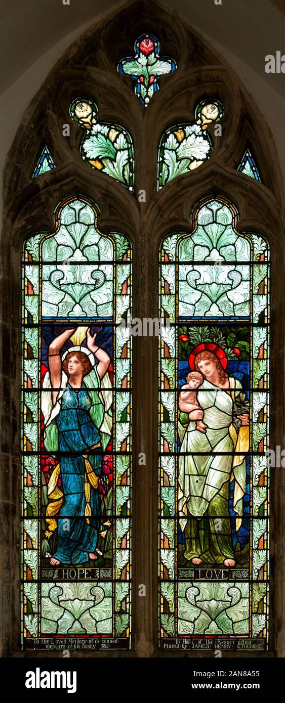 Stained glass window depicting Hope and Love designed by Henry Holiday ...