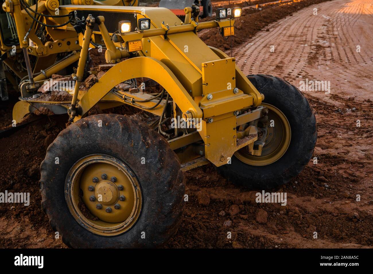 Grader is working on road construction. Grader industrial machine on ...