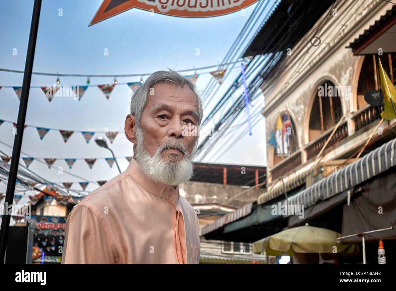 Elderly asian man hi-res stock photography and images - Alamy