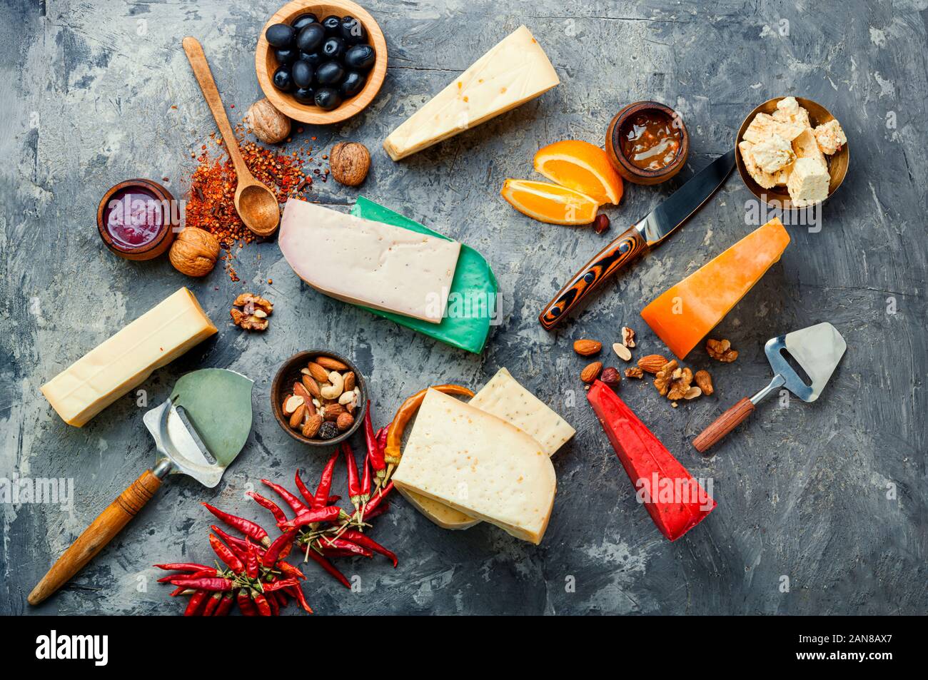 Large assortment of international cheese on slate background.Cheese ...