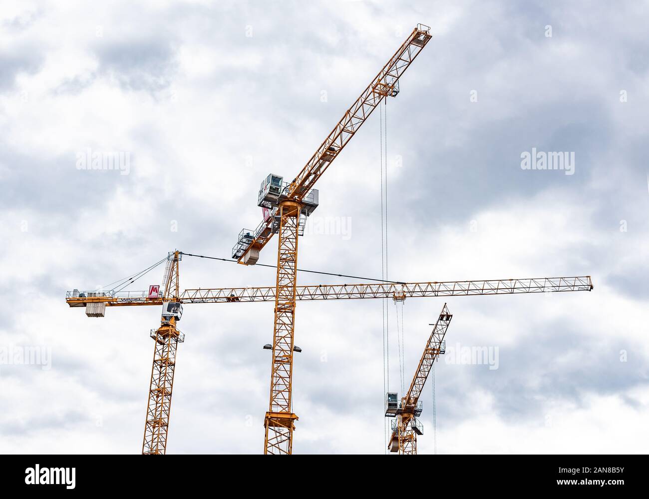 Construction tower cranes Stock Photo - Alamy